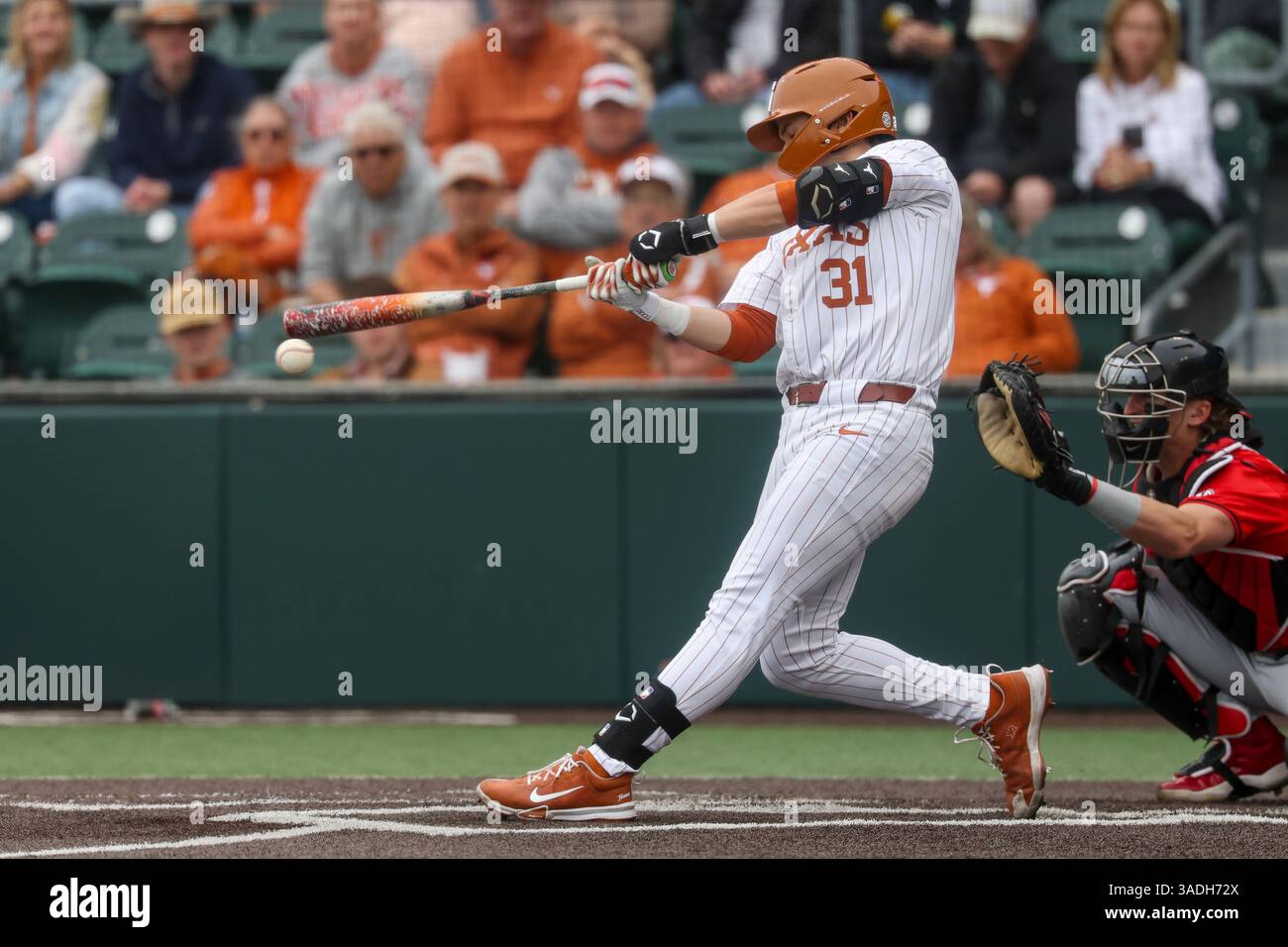 AUSTIN, TX - APRIL 05: Texas infielder Casey Borba (31) hits a double ...