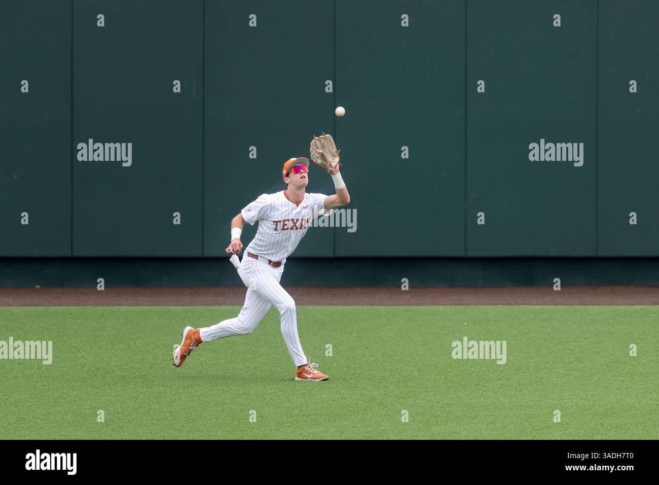 AUSTIN, TX - APRIL 05: Texas outfielder Will Gasparino (8) catches a ...