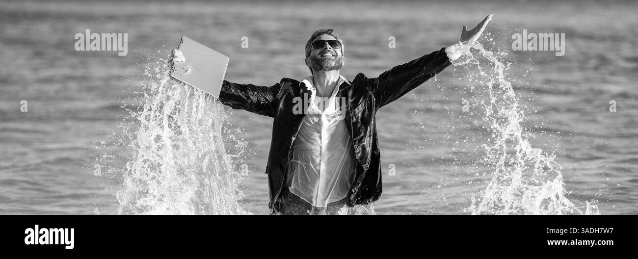 Remote working. businessman have fun at beach. happy businessman at sea ...