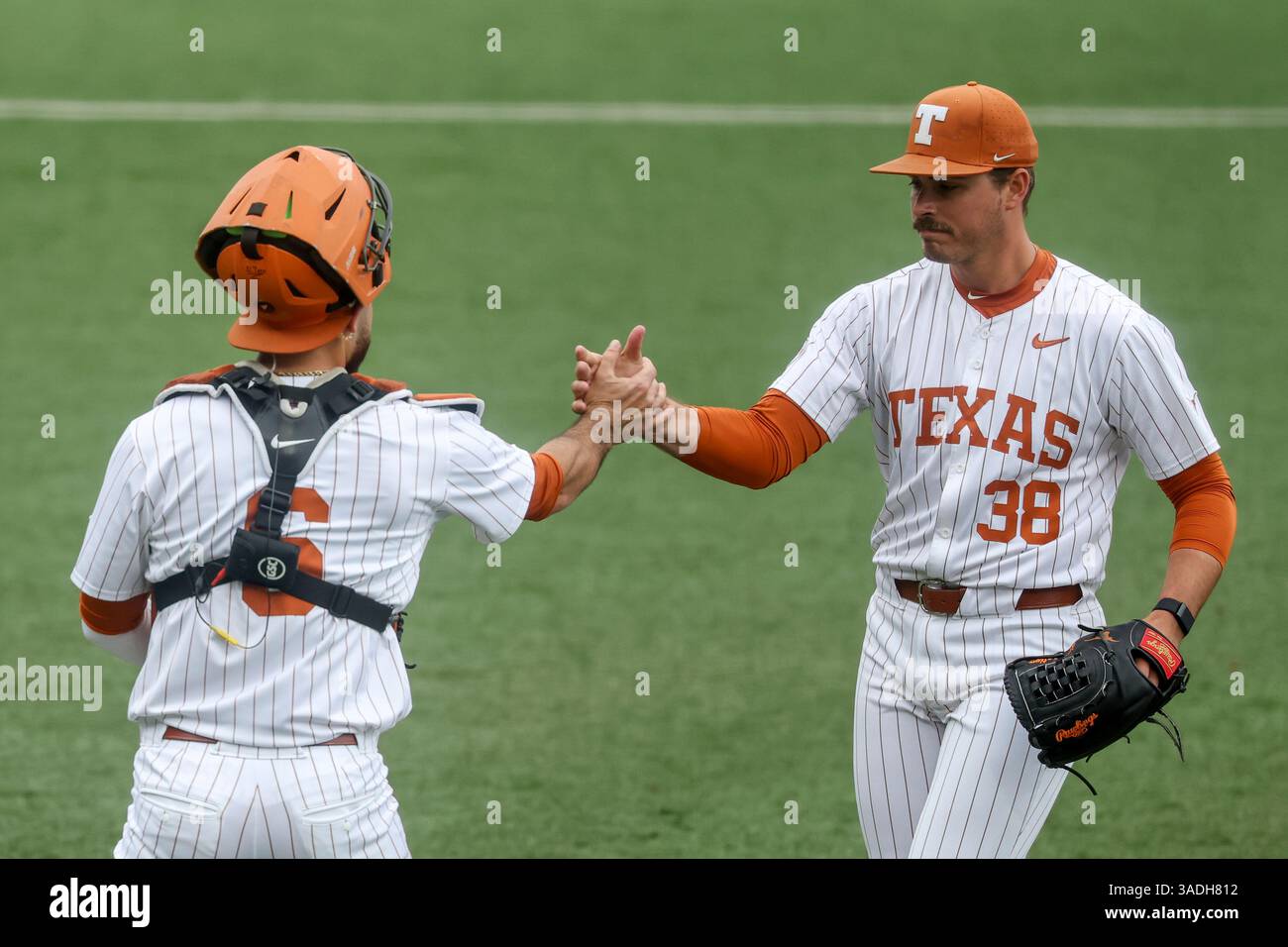 AUSTIN, TX - APRIL 05: Texas pitcher Max Grubbs (38) and Texas catcher ...