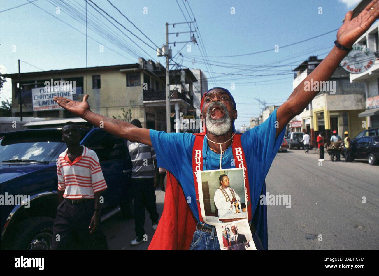 Feb 12, 1996; Port au Prince, HAITI; Haitians sing and dance for newly ...
