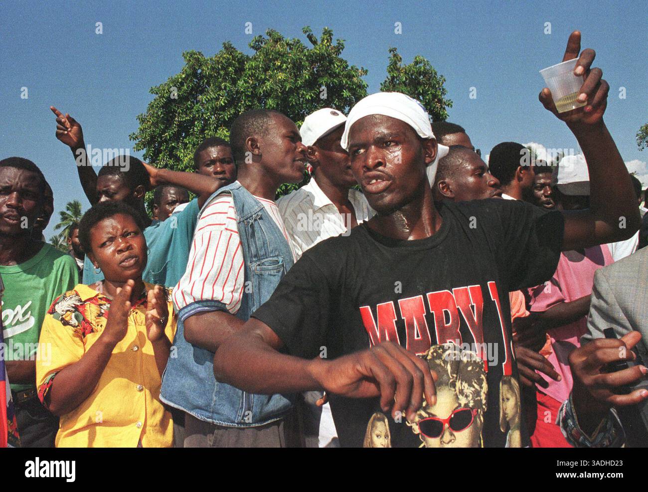 Feb 12, 1996; Port au Prince, HAITI; Haitians sing and dance for newly ...