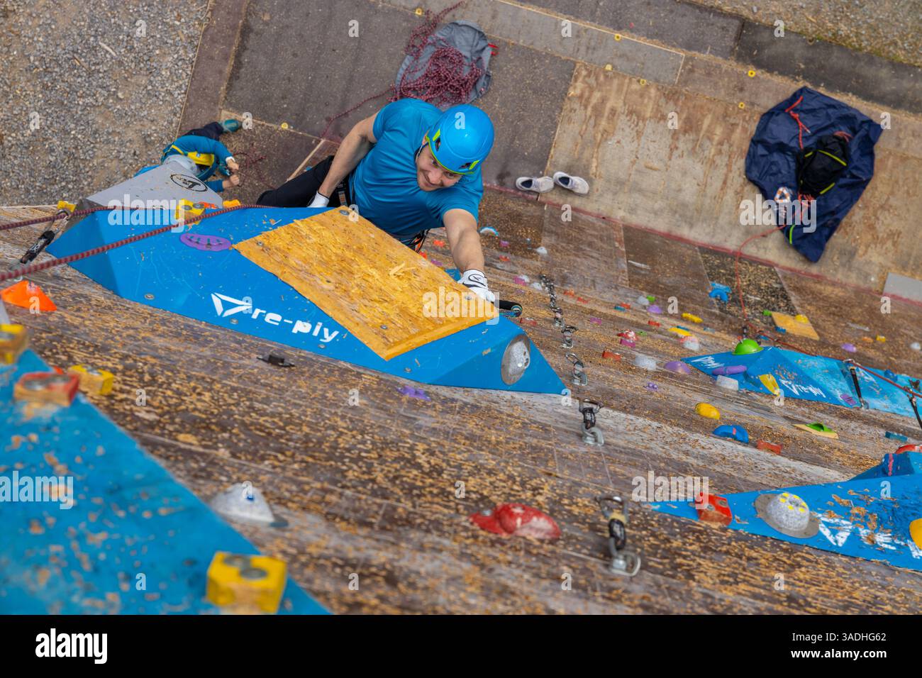Climber on the climbing wall. Drytooling and artificial ice climbing ...