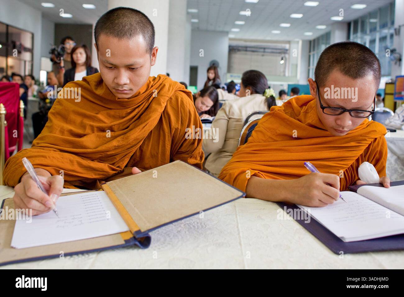 Sep 22, 2009 - Bangkok, Thailand - Buddhist monks sign get well notes ...
