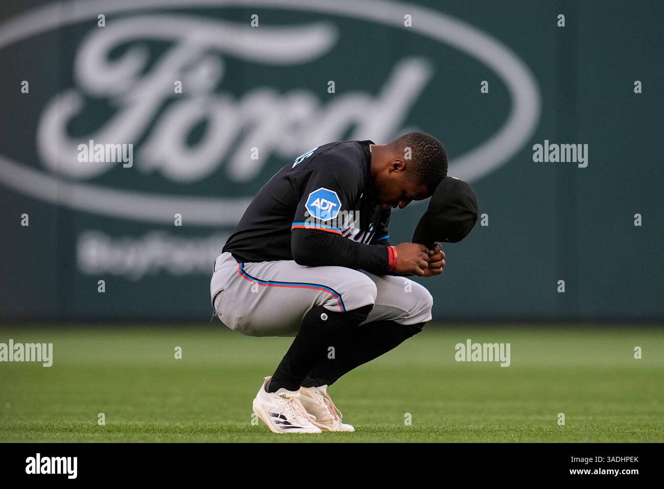 Miami Marlins shortstop Xavier Edwards prays before a baseball game ...