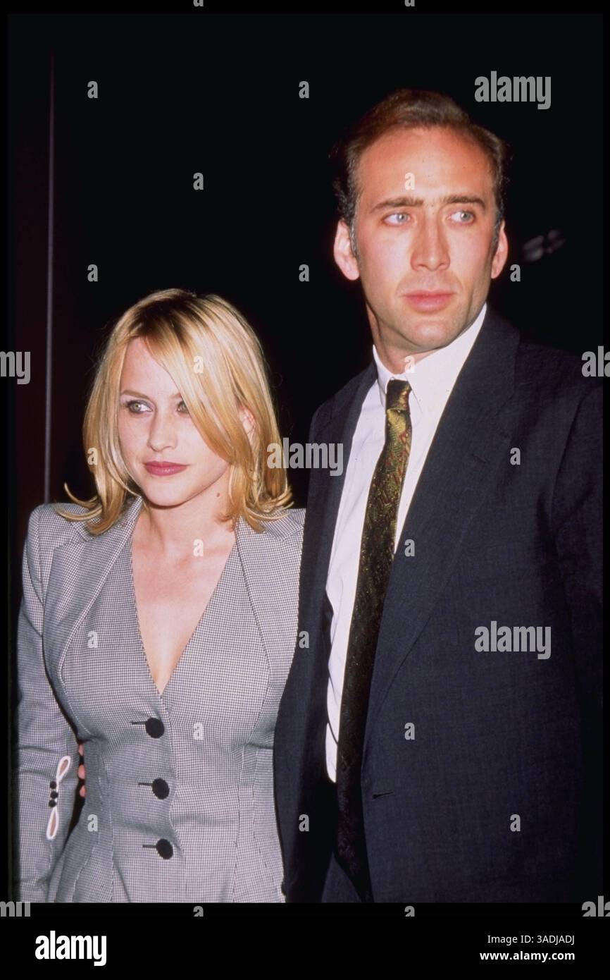 NICOLAS CAGE and wife PATRICIA ARQUETTE attend the premiere of "Beyond ...