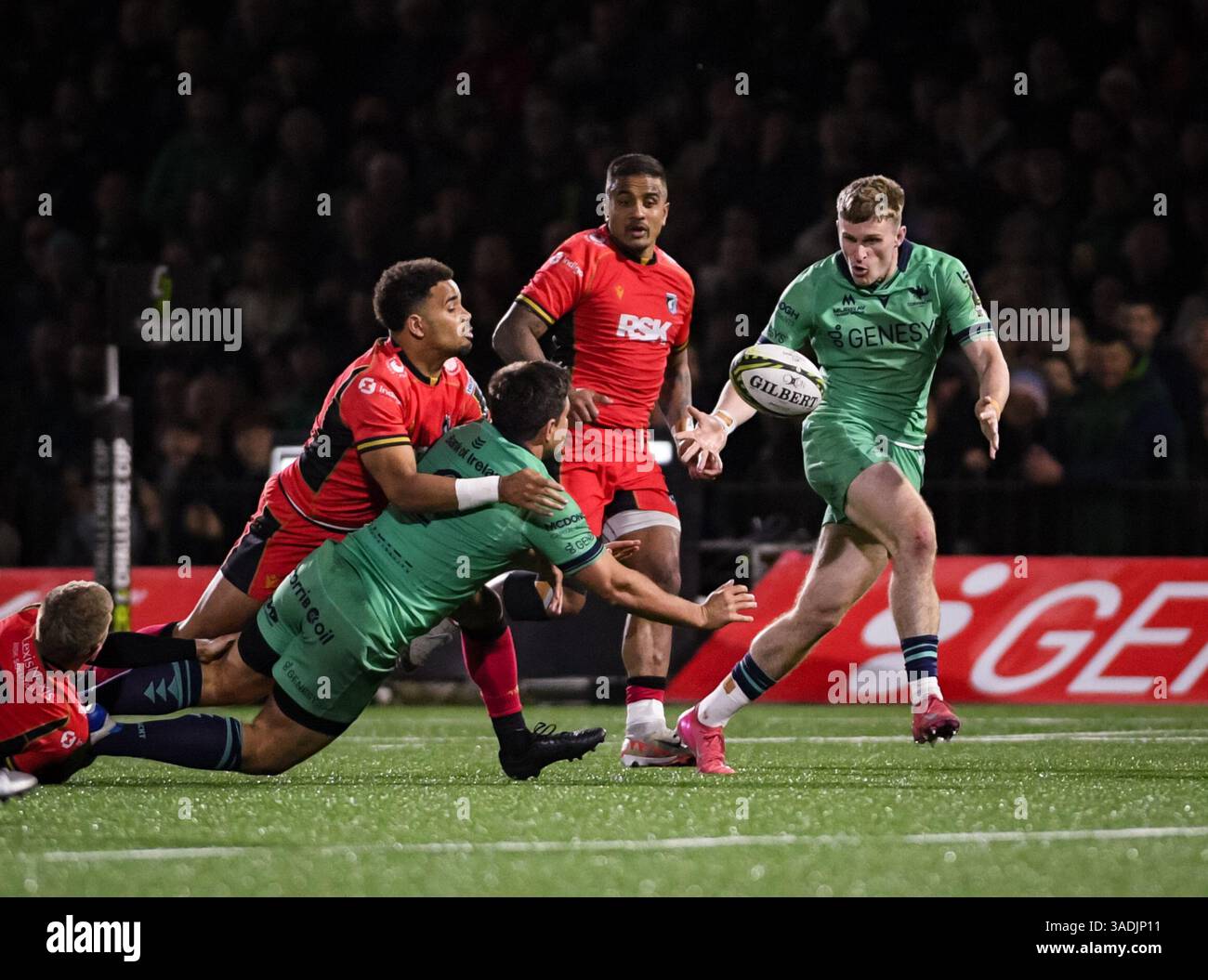 Galway, Ireland. 5th April, 2025. Connacht's Finn Treacy receives a ...