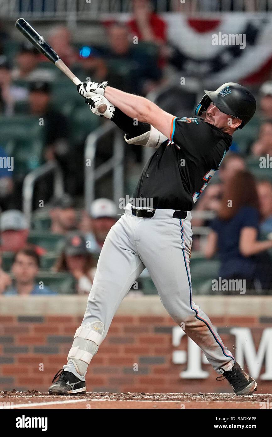Miami Marlins catcher Liam Hicks (34) hits an RBI-single against the ...