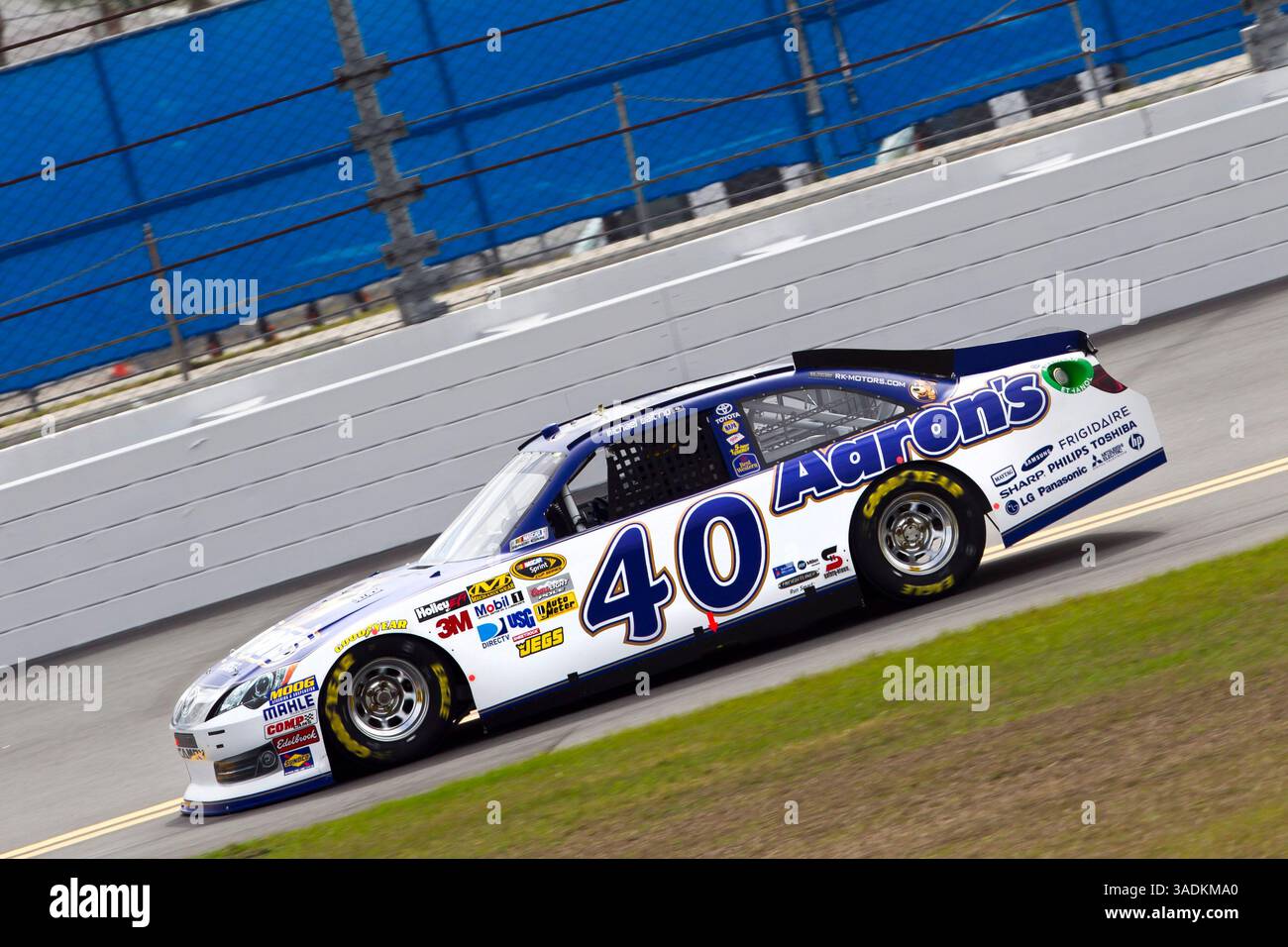 DAYTONA,FL - FEB 18, 2012: Michael Waltrip (40) takes to the track for ...