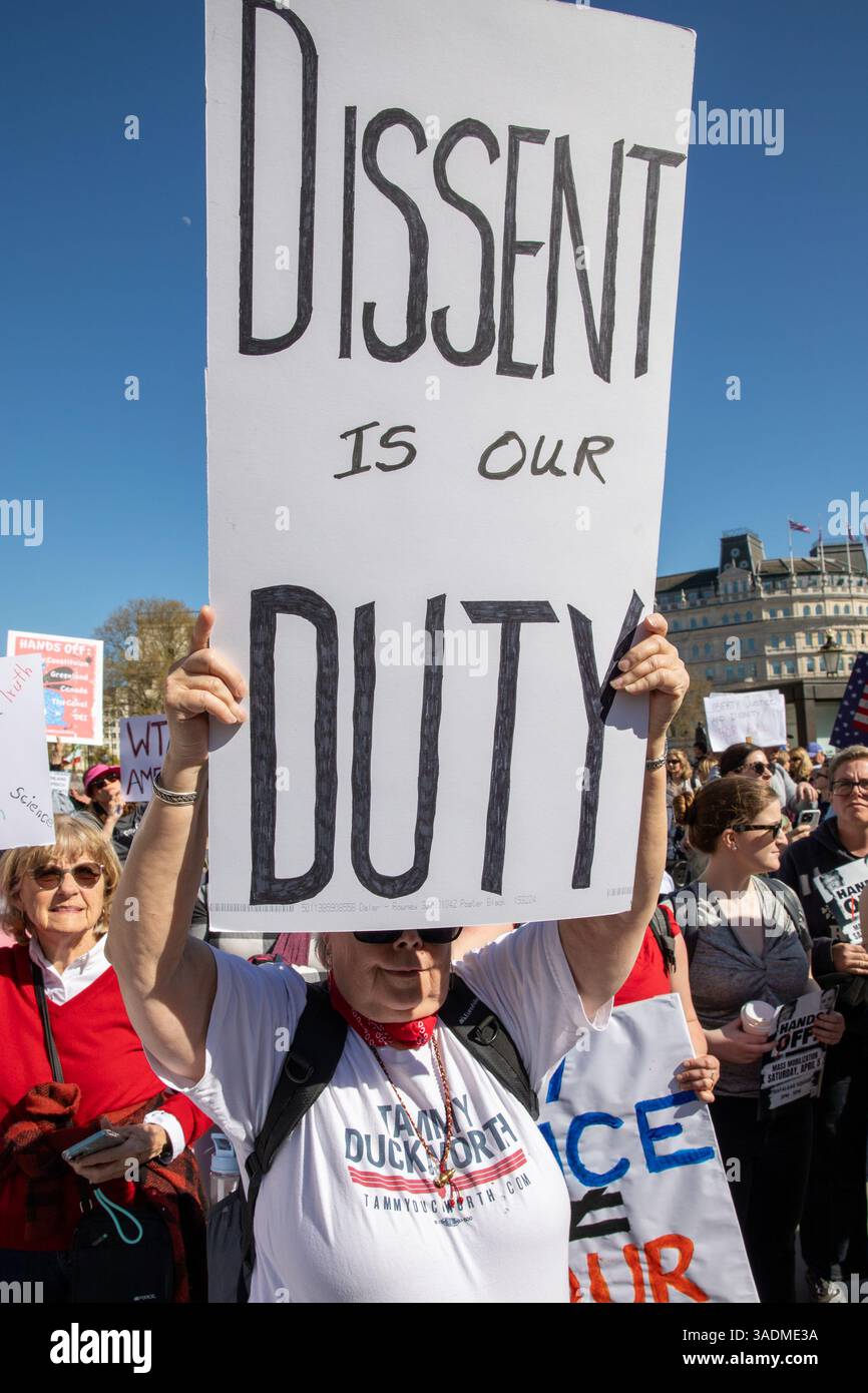 An activist holds a placard during an anti Donald trump demonstration ...