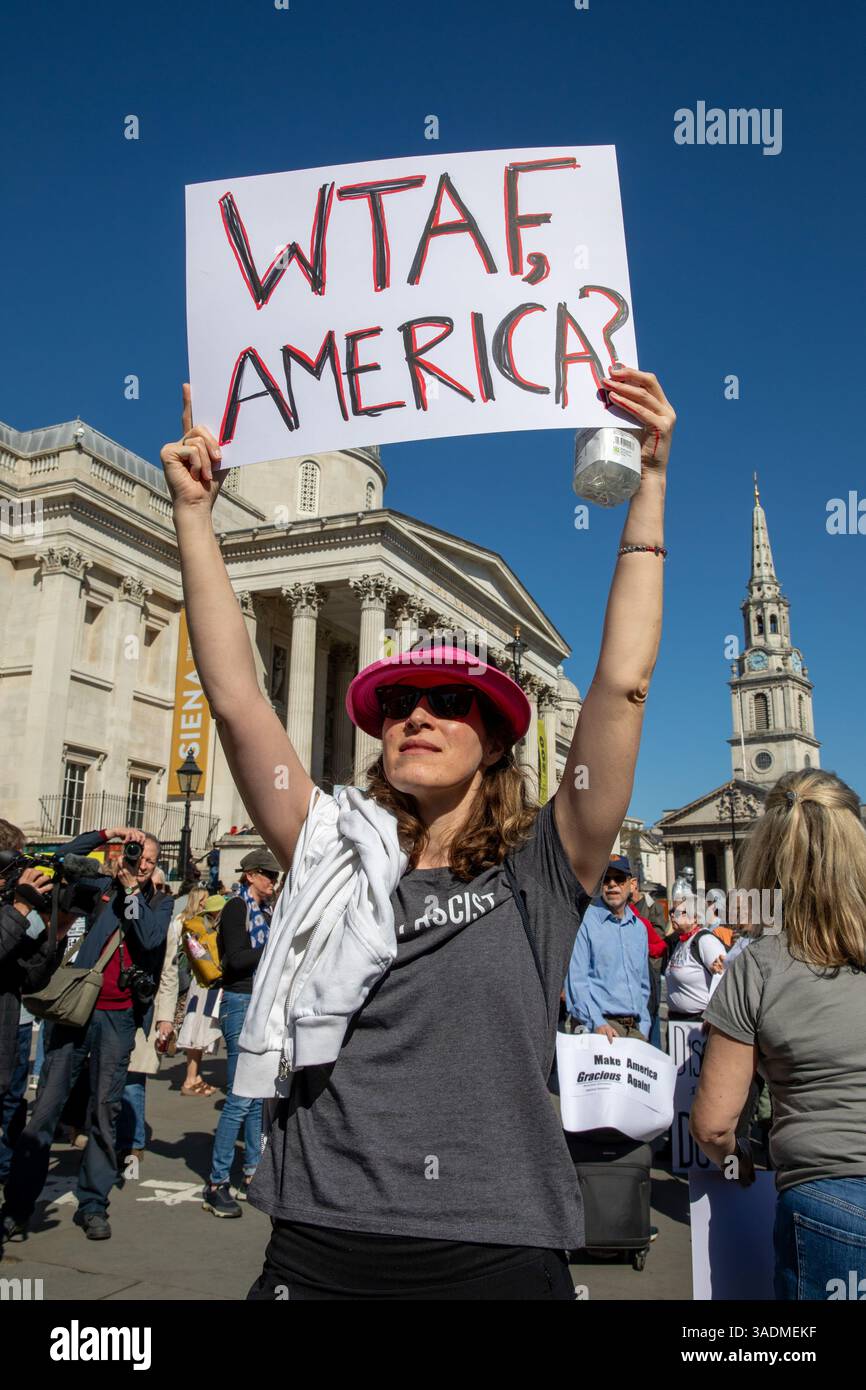 An activist holds a placard during an anti Donald trump demonstration ...