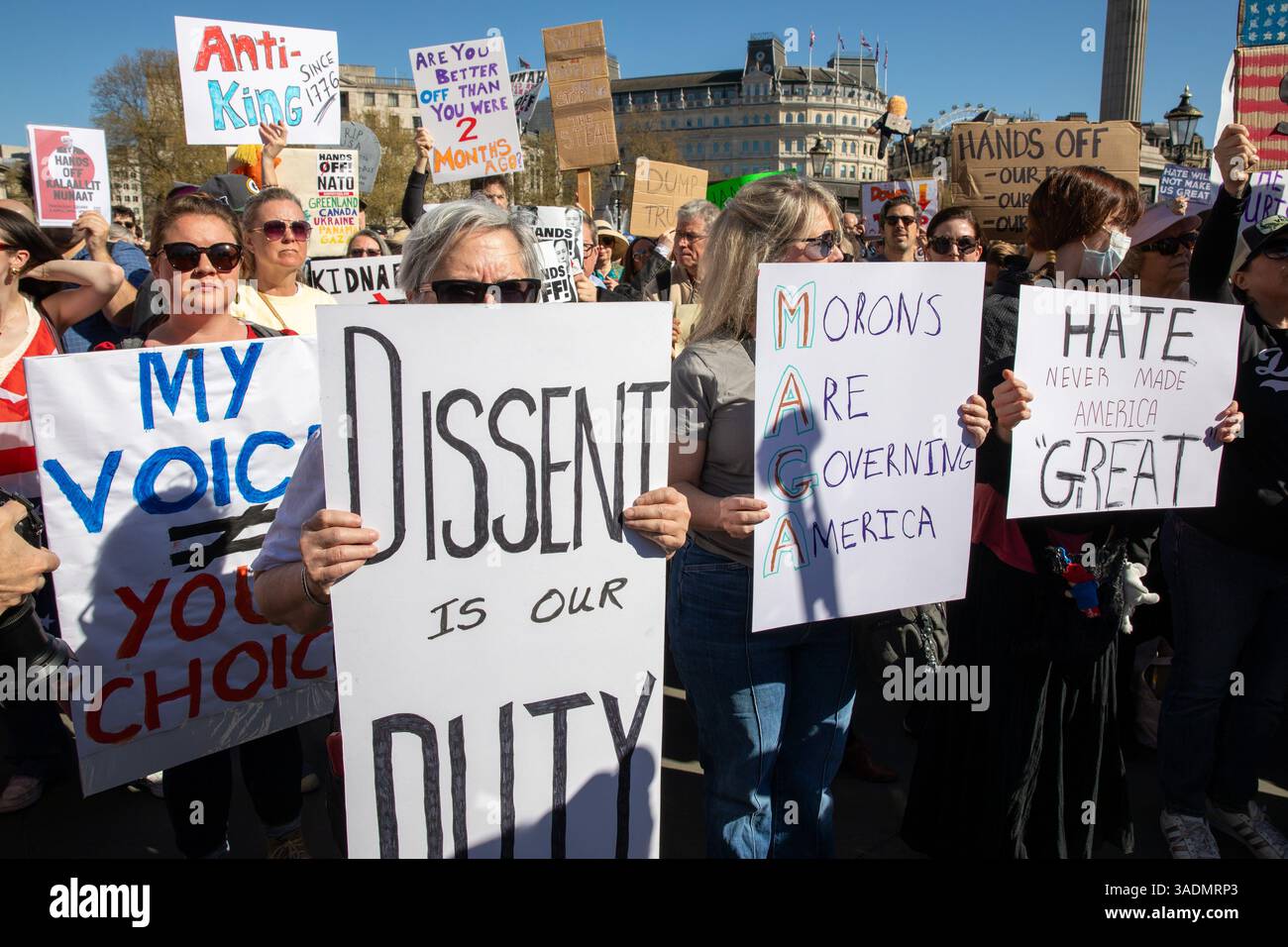 Demonstrators hold placards during an anti Donald trump rally. A ...