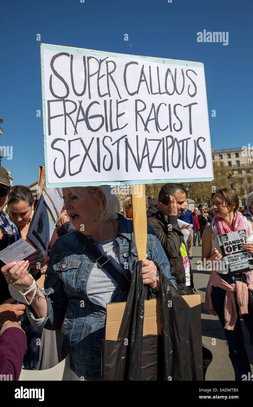 An activist holds a placard during an anti Donald trump demonstration ...