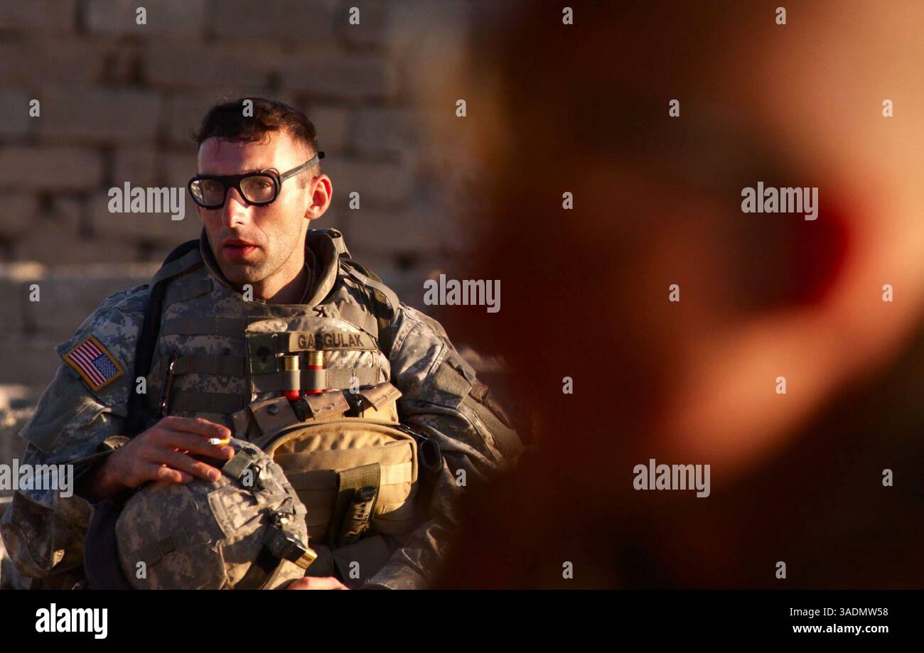 Nov 22, 2005; Bayji, IRAQ; Spc. CHAD GARGULAK takes a break from ...