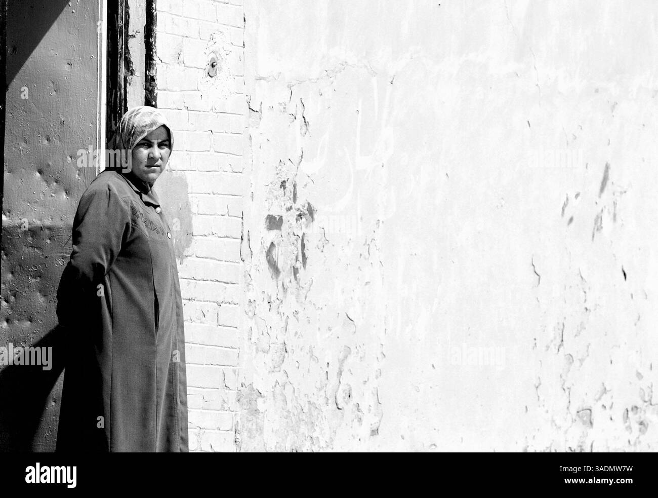 Mar 07, 2006; Ad Dawr, Saluhidin, IRAQ; An Iraqi woman looks on for a ...