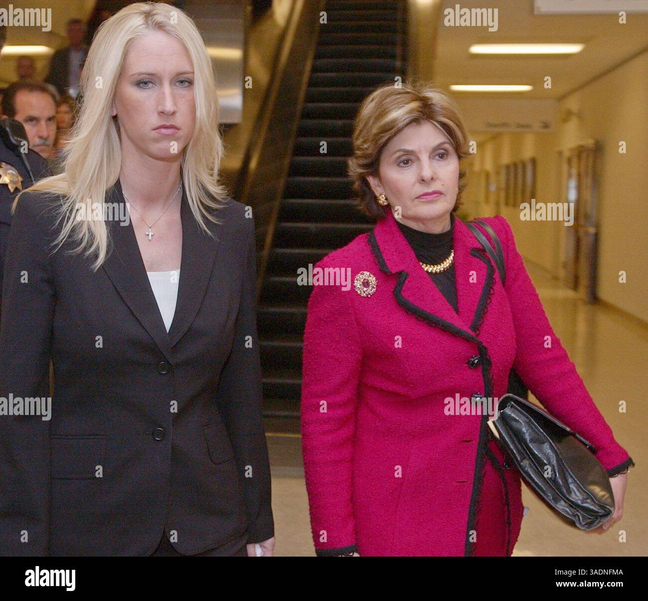 Aug 10, 2004; Redwood City, CA, USA; AMBER FREY, left, leaves with her ...