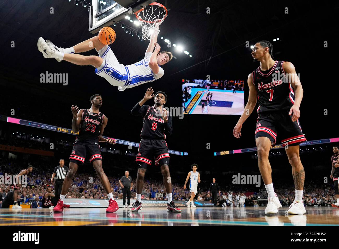 Duke forward Cooper Flagg dunks against the Houston during the first ...