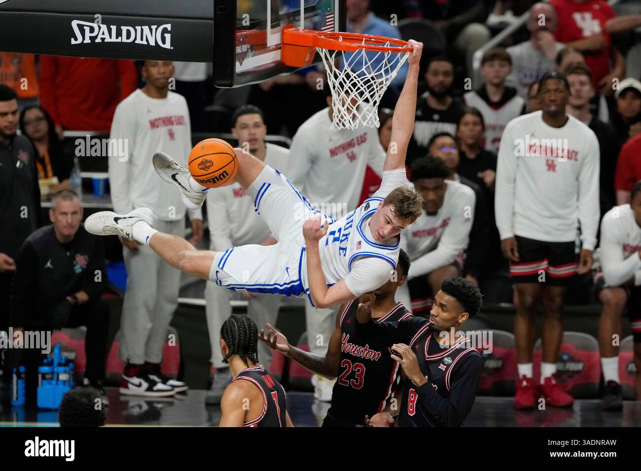 Duke's Cooper Flagg (2) dunks the ball against Houston during the first ...