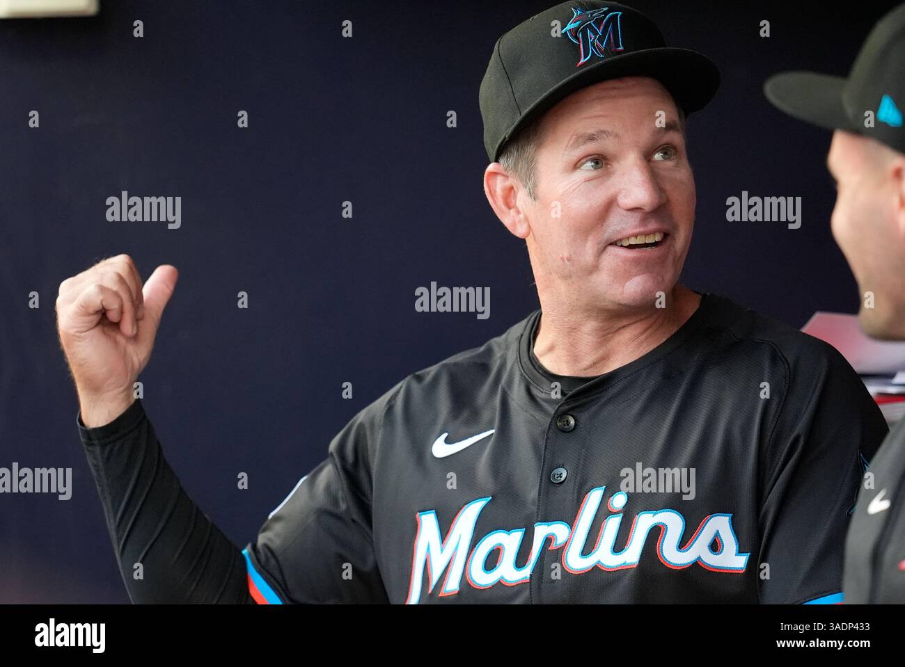 Miami Marlins manager Clayton McCullough speaks in the dugout before a ...