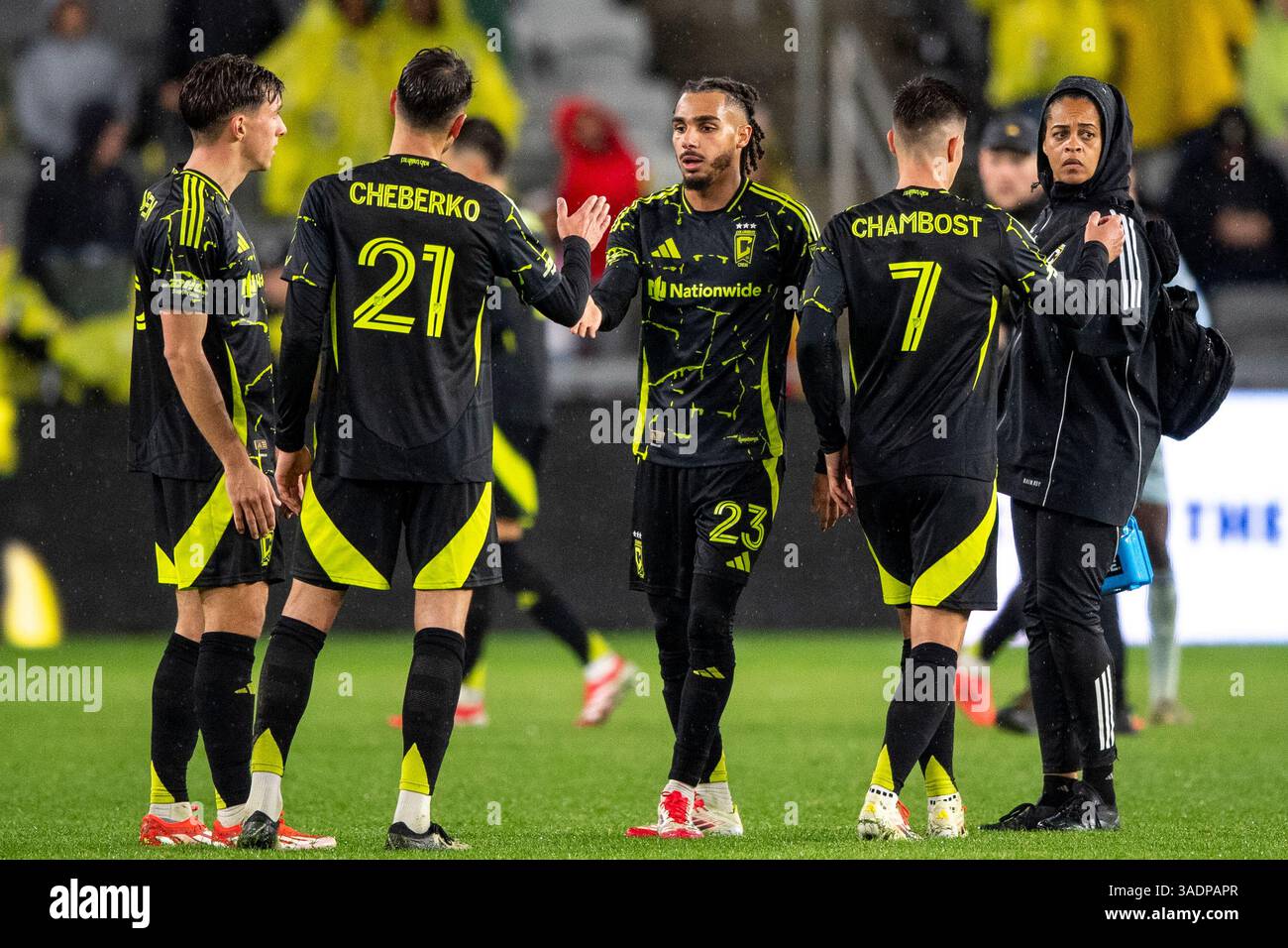 Columbus Crew defender Yevhen Cheberko (21) high fives Columbus Crew ...