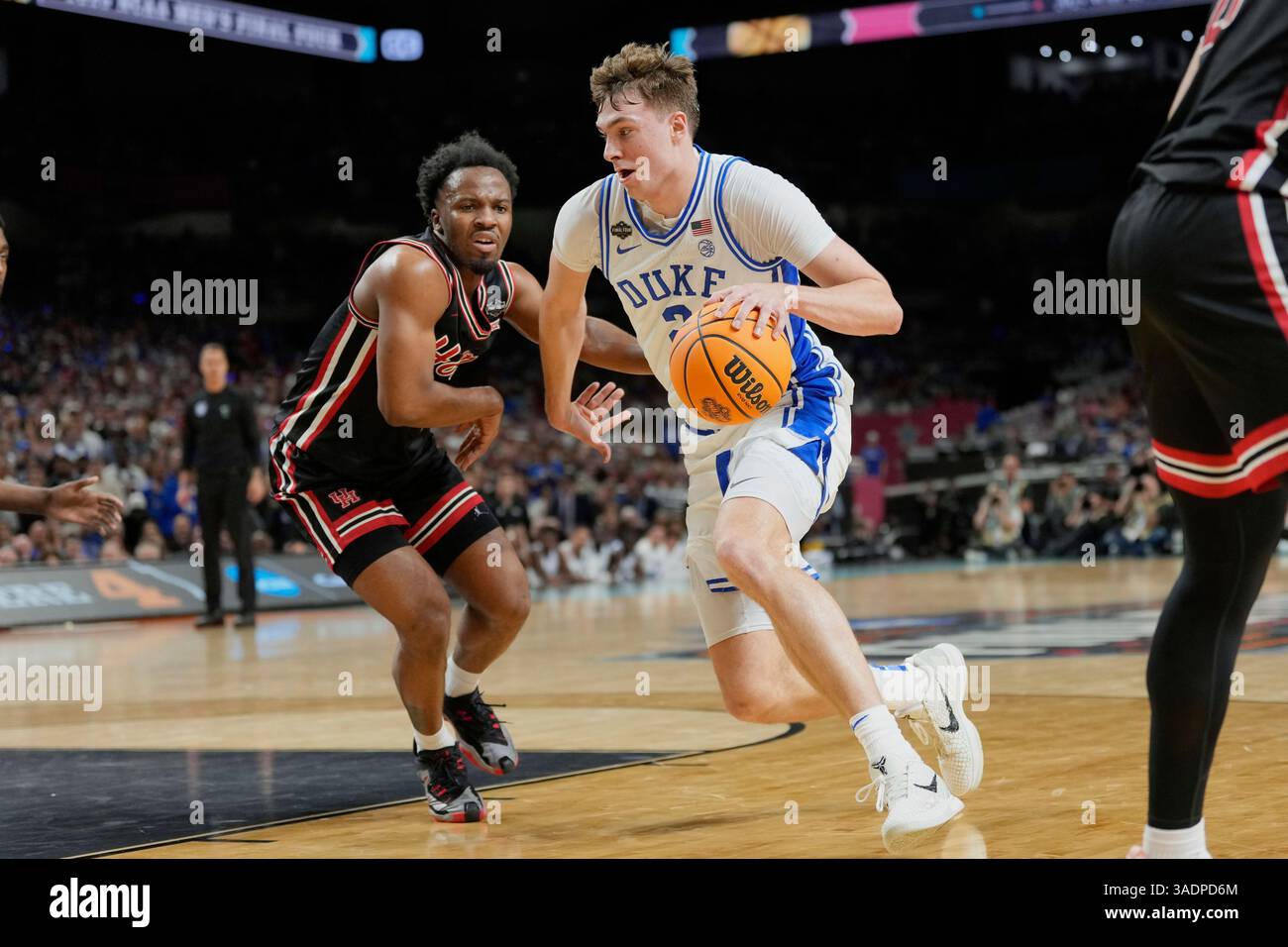 Duke's Cooper Flagg (2) drives to the basket as Houston's L.J. Cryer ...