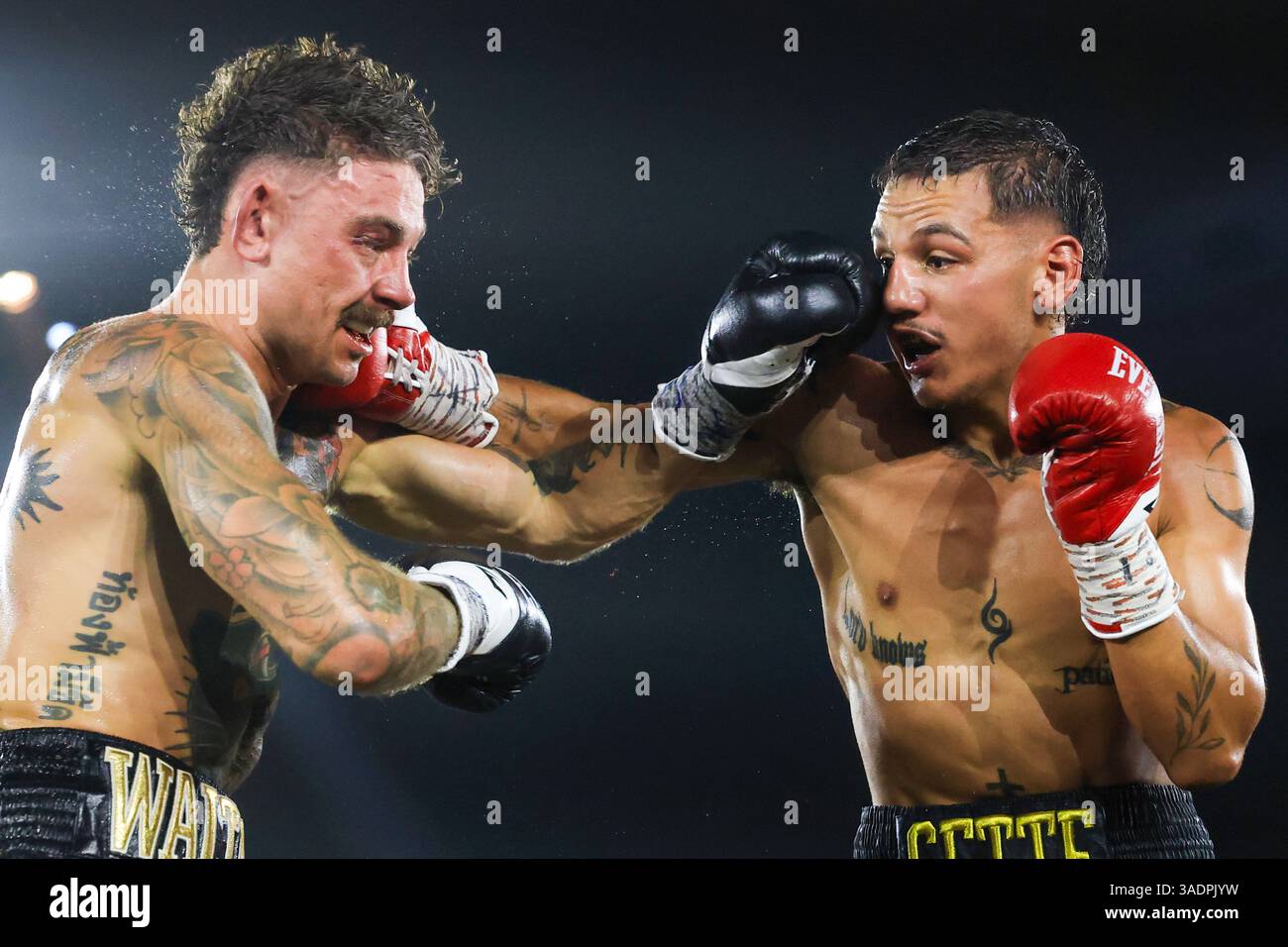 Newcastle, Australia. 06th Apr, 2025. Isaias Sette (R) throws a punch ...