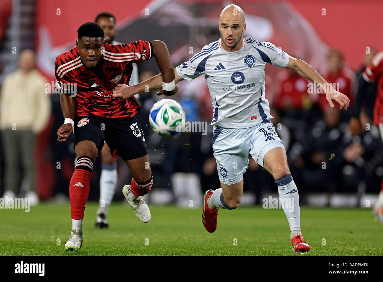 New York Red Bulls forward Serge Ngoma (81) battles for the ball with ...