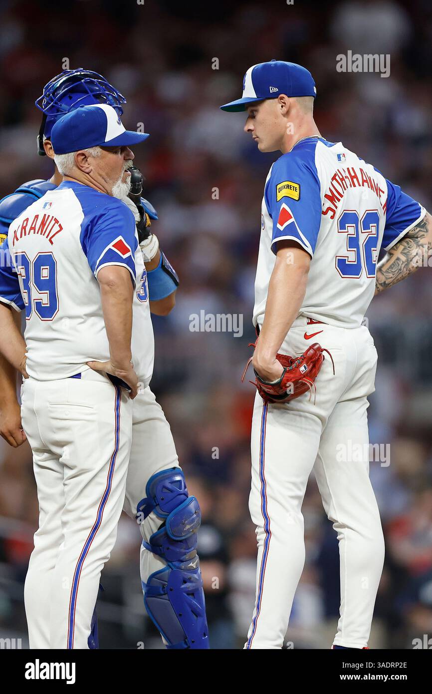 ATLANTA, GA - APRIL 05: Rick Kranitz #39 of the Atlanta Braves confers ...