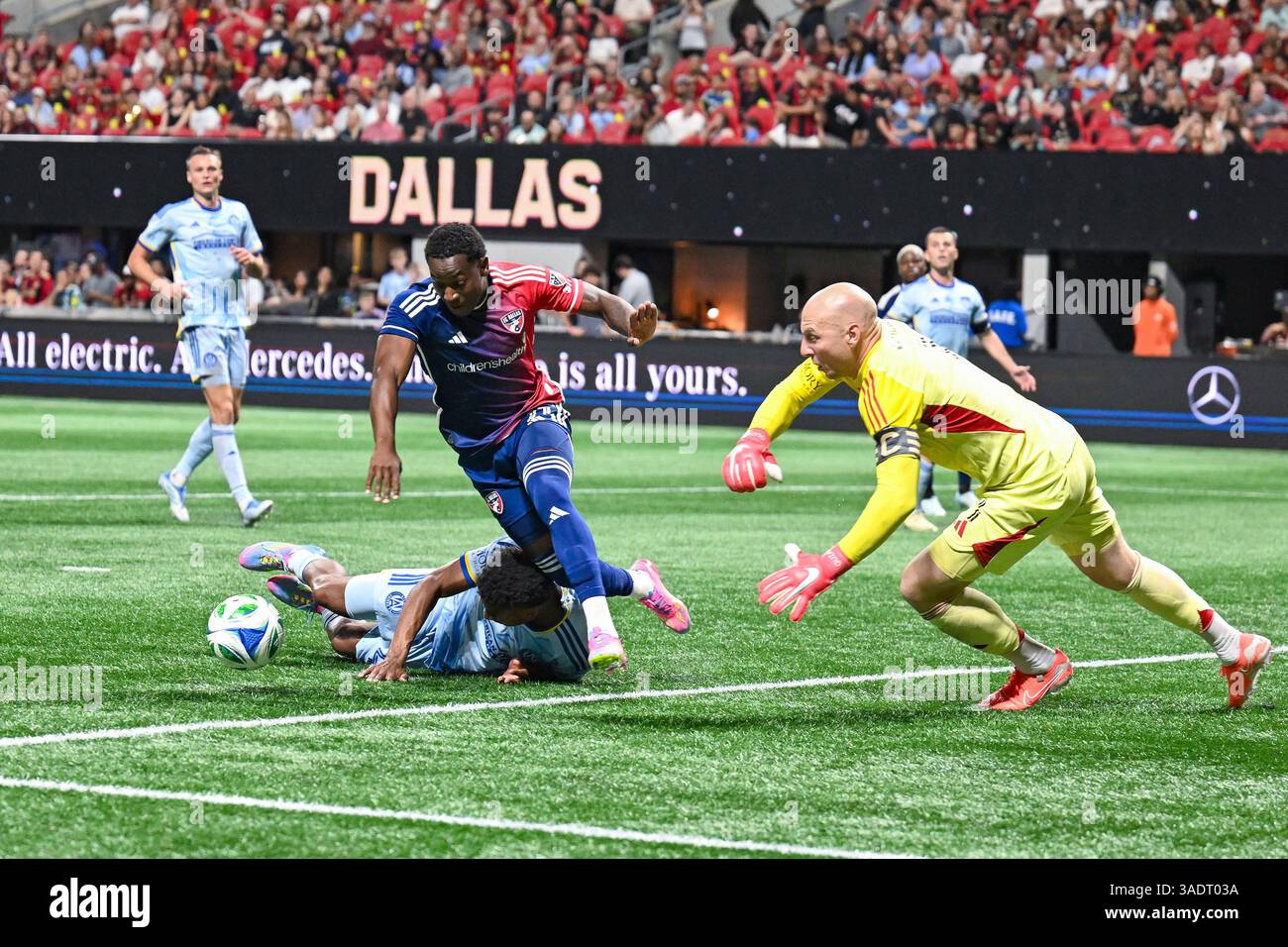 ATLANTA, GA – APRIL 05: Anderson Julio #11 of Dallas and Brad Guzan #1 ...