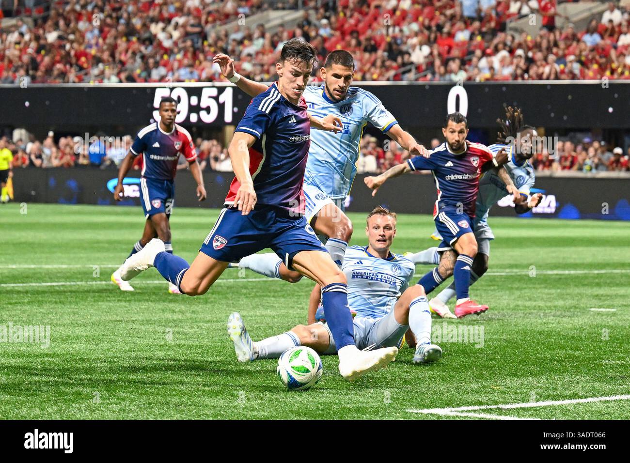 ATLANTA, GA – APRIL 05: Petar Musa #9 of Dallas shoots and scores a ...
