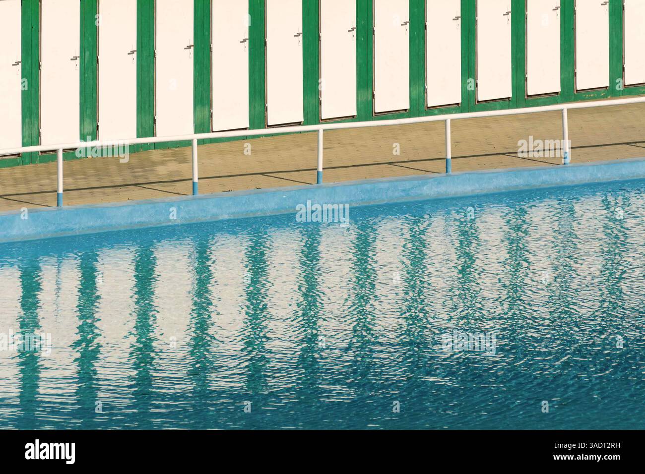 Swimming pool minimalist image. The water surface of the blue outdoor ...