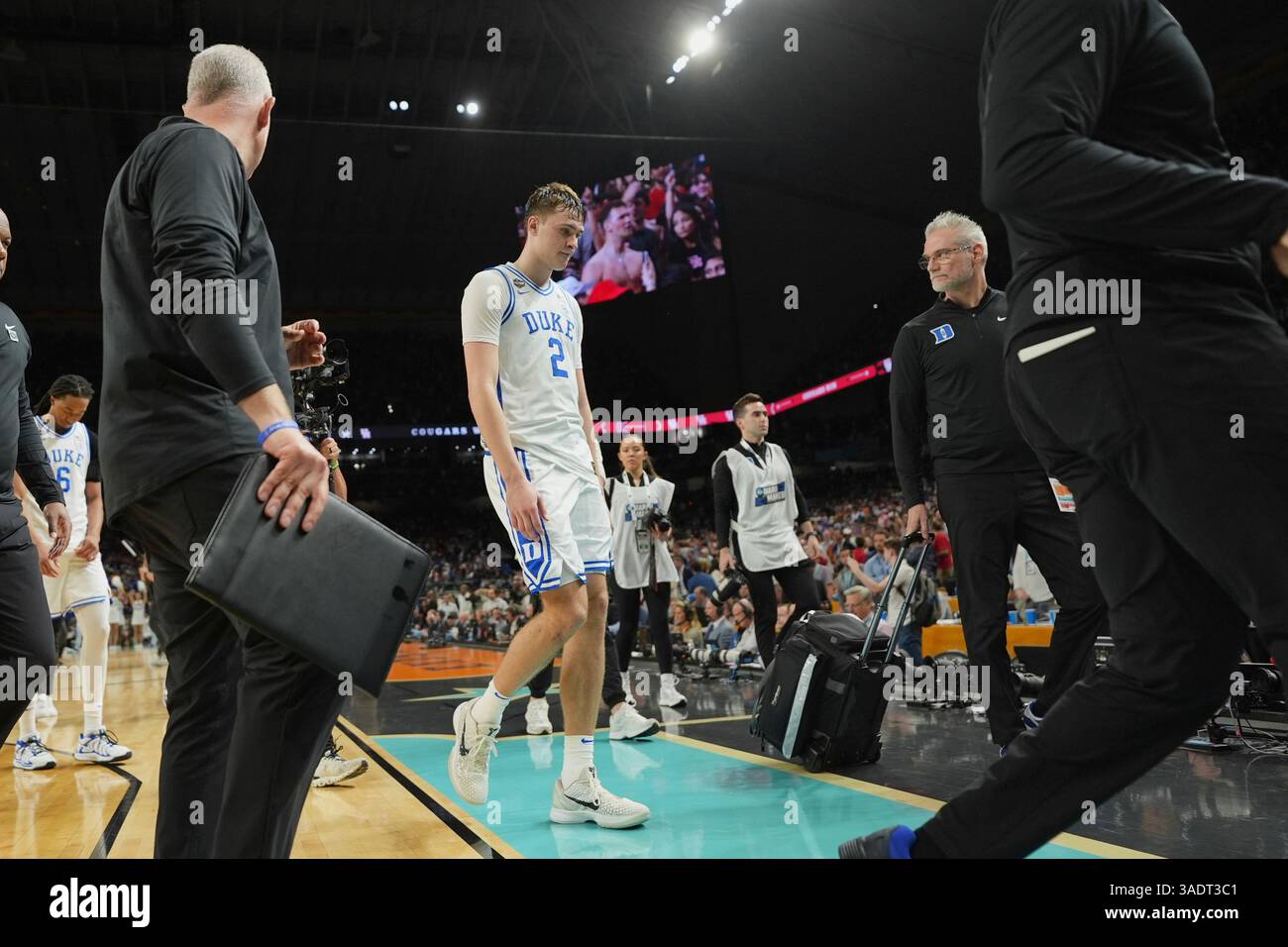 Duke's Cooper Flagg (2) leaves the court after Duke lost to Houston in ...