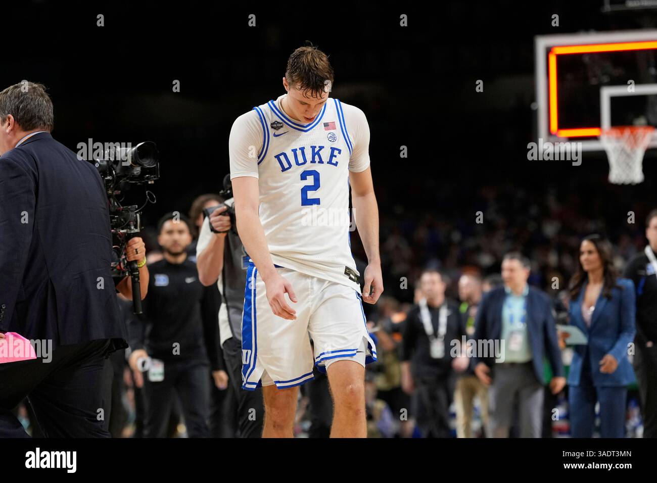 Duke's Cooper Flagg (2) walks off the court after Duke lost to Houston ...