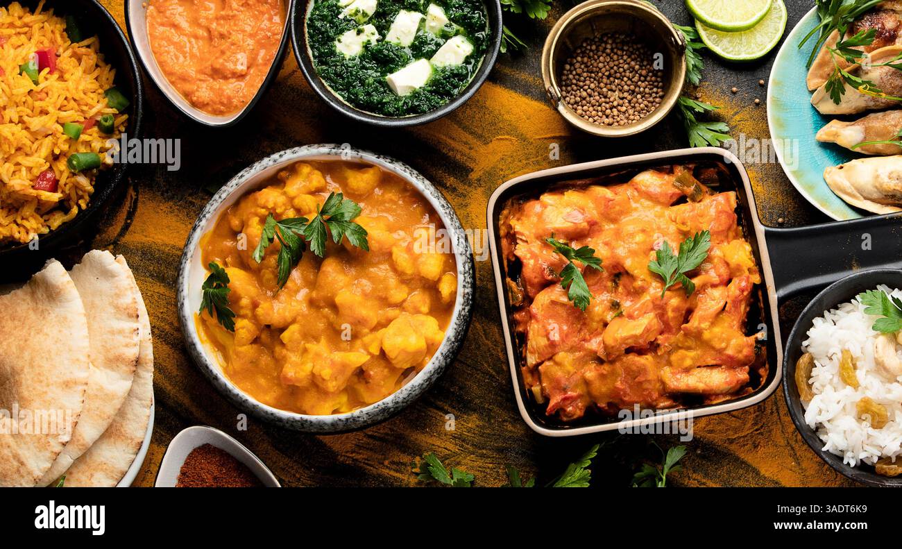 Traditional indian food on a black background. Indian cuisine. Top view ...