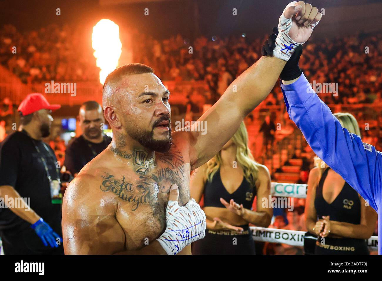 Liam Talivaa celebrates victory in the Australian Heavyweight Title ...