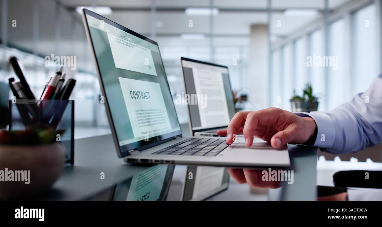 Reading Lease Agreement Contract Document On Laptop Computer Stock ...