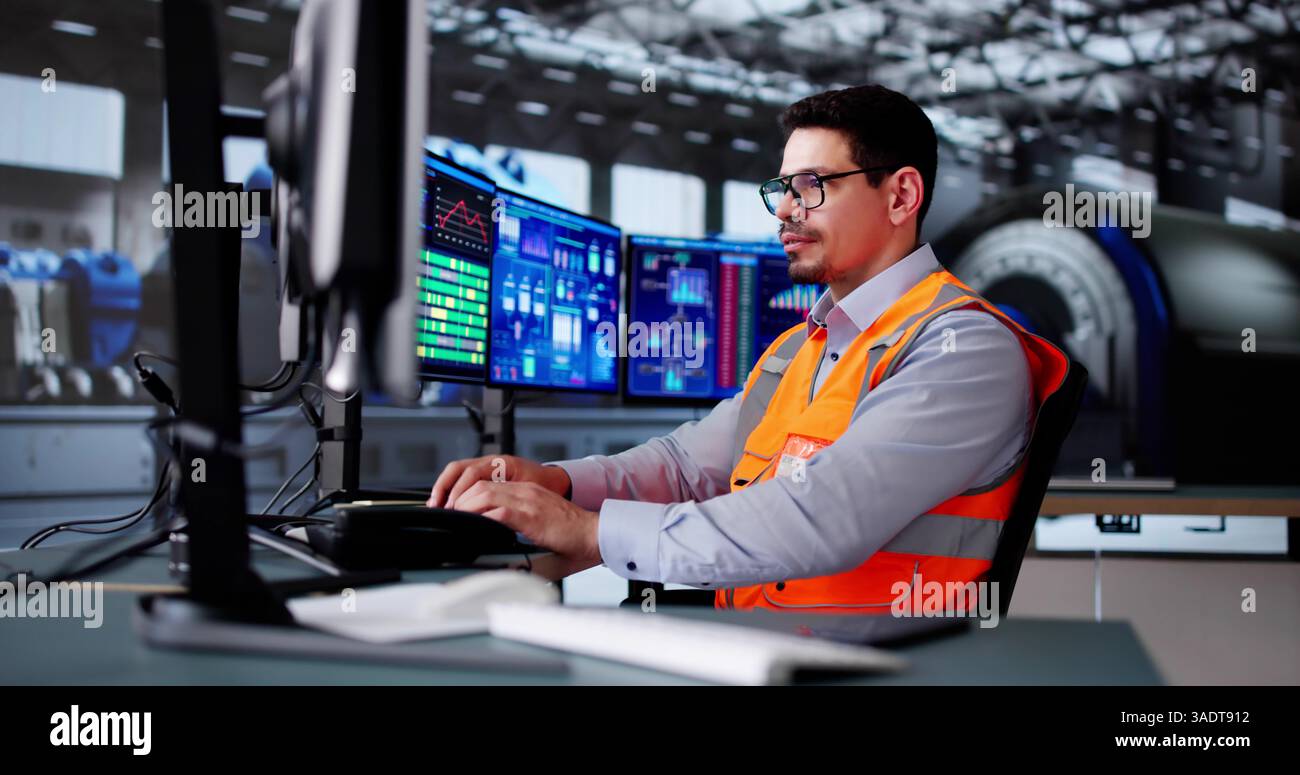 Latino Engineer Monitors Oil Refinery Plant's SCADA System On Desktop ...