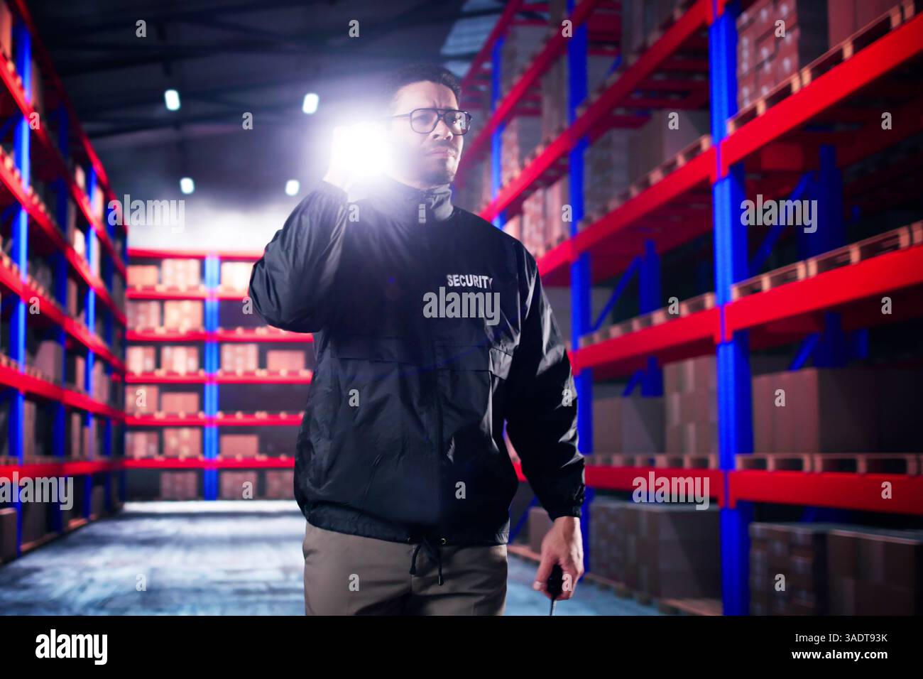 Security Guard Man With Flashlight At Cargo Distribution Warehouse ...