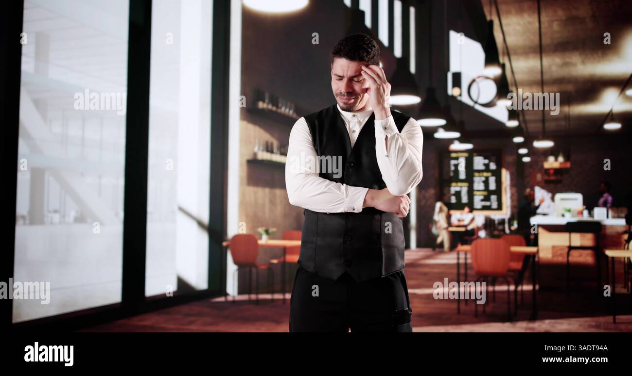 Sad Bartender In Cafe Or Restaurant. Upset Waiter Employee Stock Photo ...