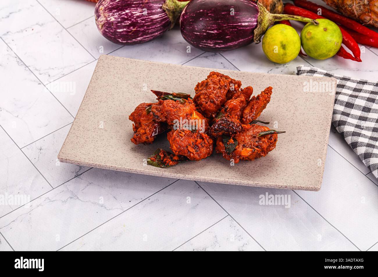 Indian cuisine hot spicy red Chicken 65 Stock Photo - Alamy