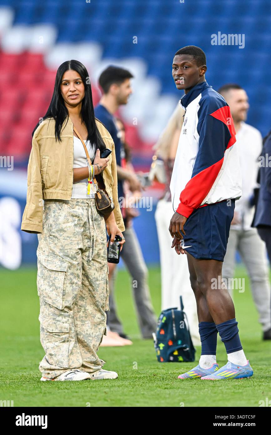 Paris, France. 05th Apr, 2025. Nuno Mendes and his girlfriend Thalyta Silva during the Ligue 1 ...