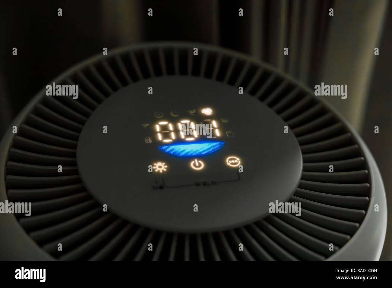 Closeup of an air purifier control panel displaying digital number 1 ...