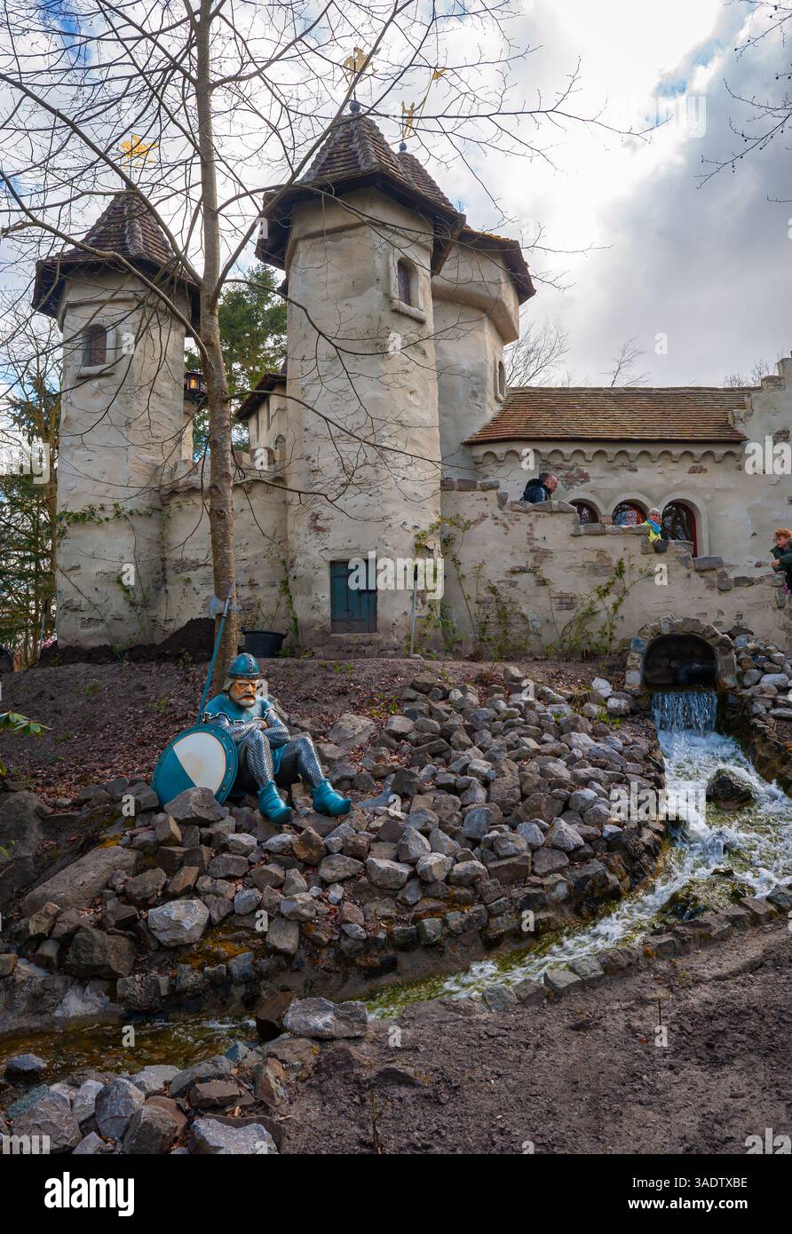 Gatekeeper is sleeping in front of the castle of Sleeping Beauty in ...