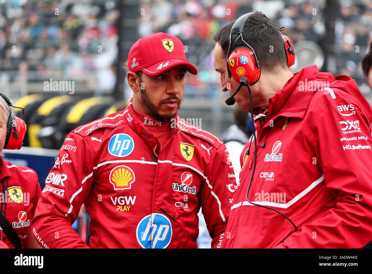 (L to R): Lewis Hamilton (GBR) Ferrari with Riccardo Adami (ITA) Ferrari Race Engineer on the ...