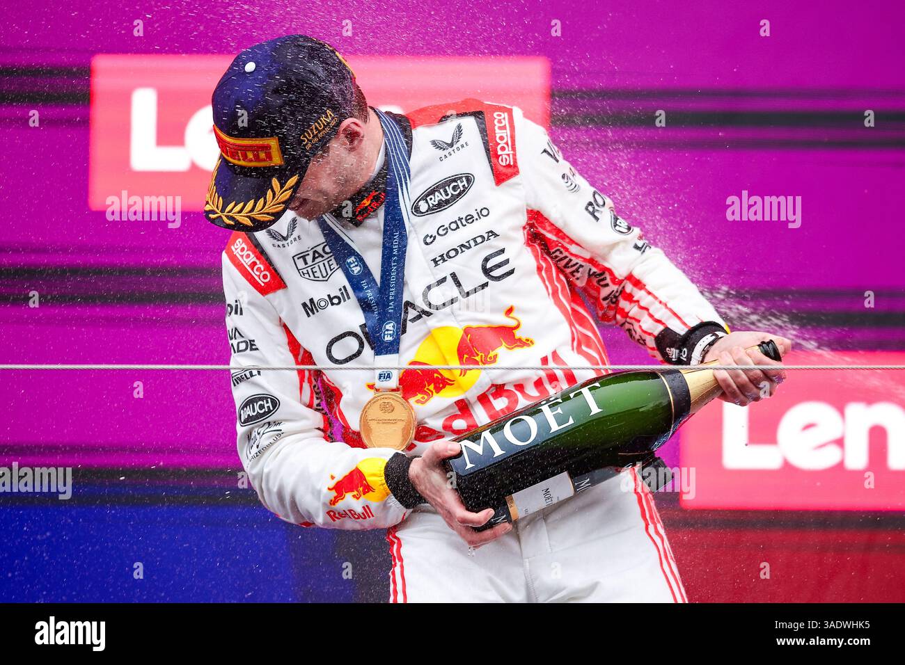 VERSTAPPEN Max (ned), Red Bull Racing RB21, portrait podium celebration ...