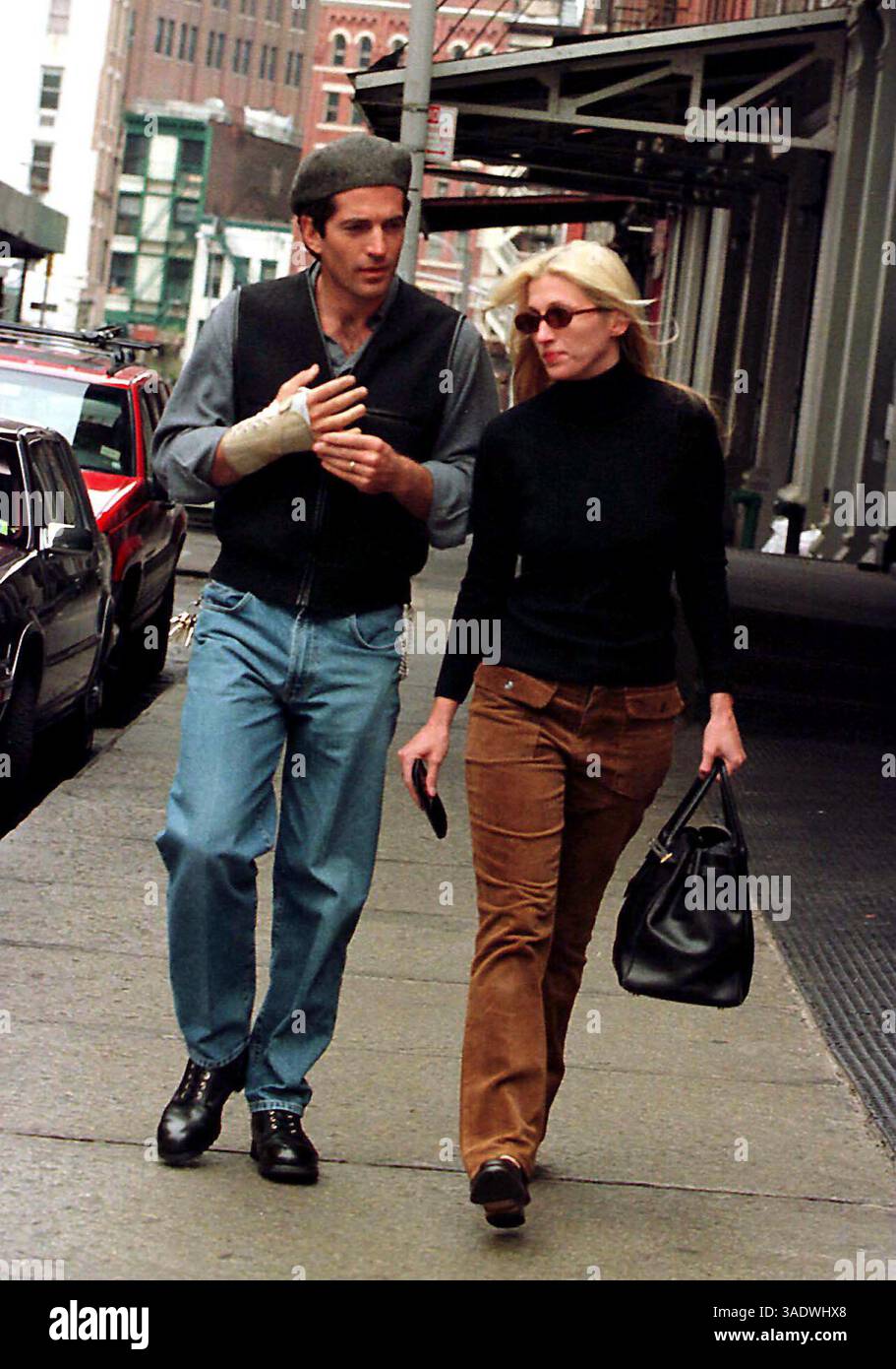 1999 - John F. Kennedy Jr and wife Carolyn Bessette Kennedy walk in ...
