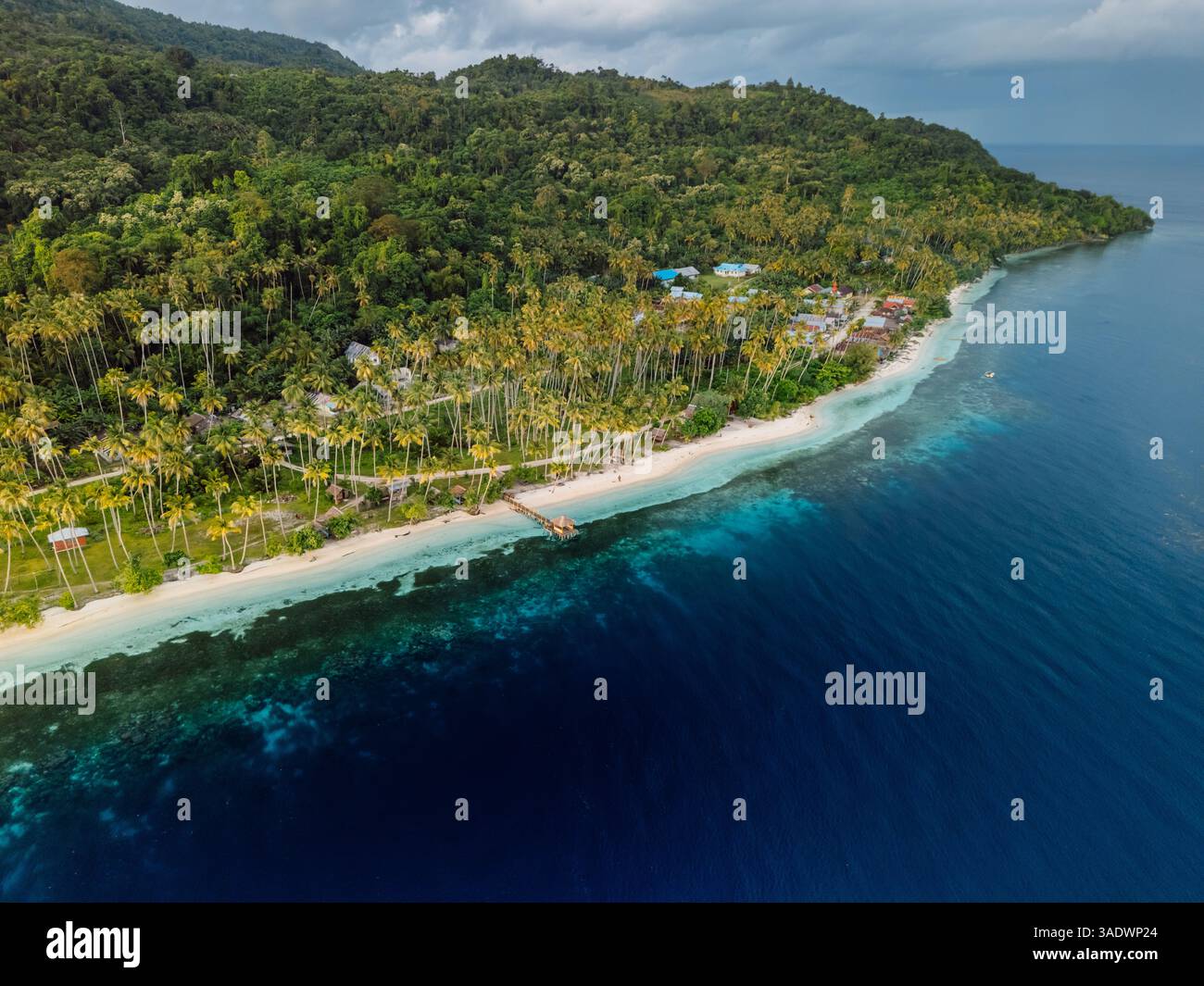 Tropical coastline with sandy beach and quiet sea in Indonesia. Travel ...