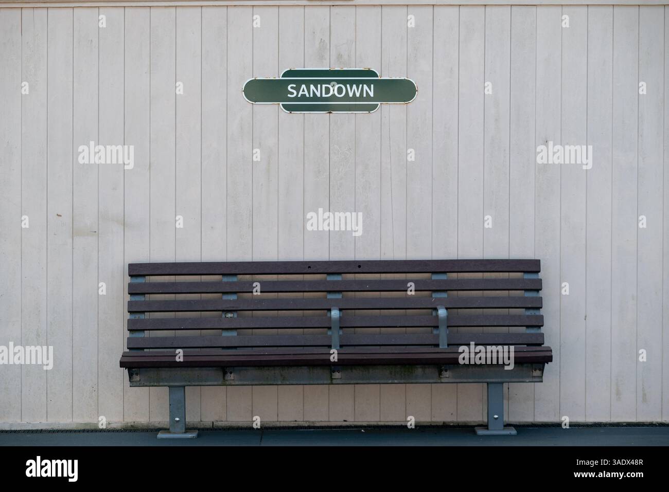 Bench on the platform of Sandown train station with no people. April ...