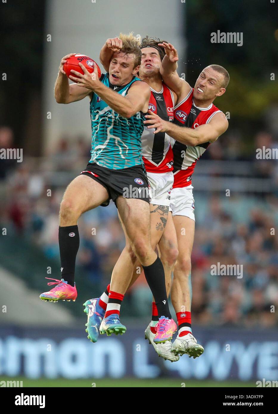 Adelaide, Australia. 06th Apr, 2025. Jason Horne-Francis of the Power marks under pressure from ...