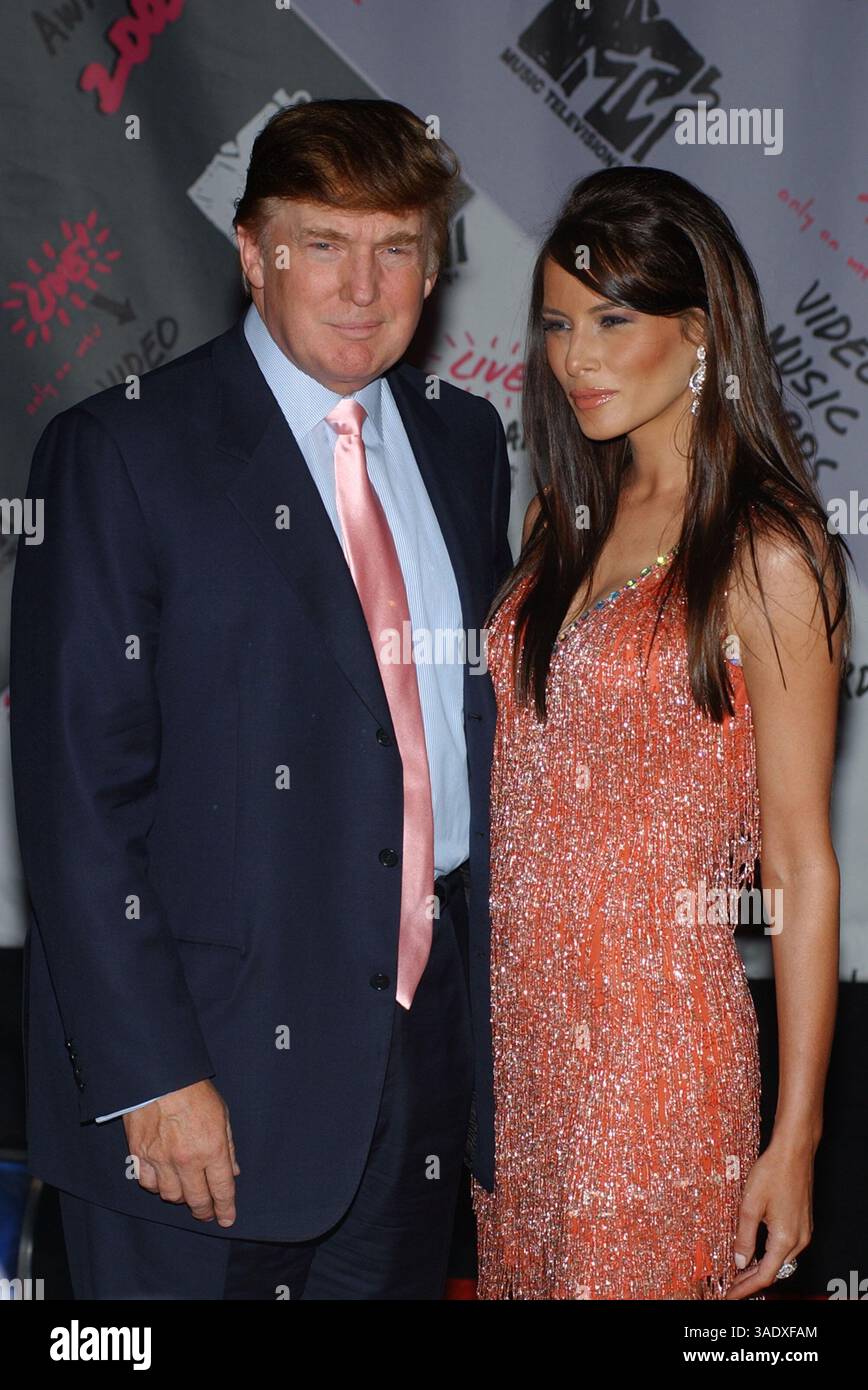 DONALD TRUMP & girlfriend model MELANIA KNAUSS arriving at the 2003 MTV ...